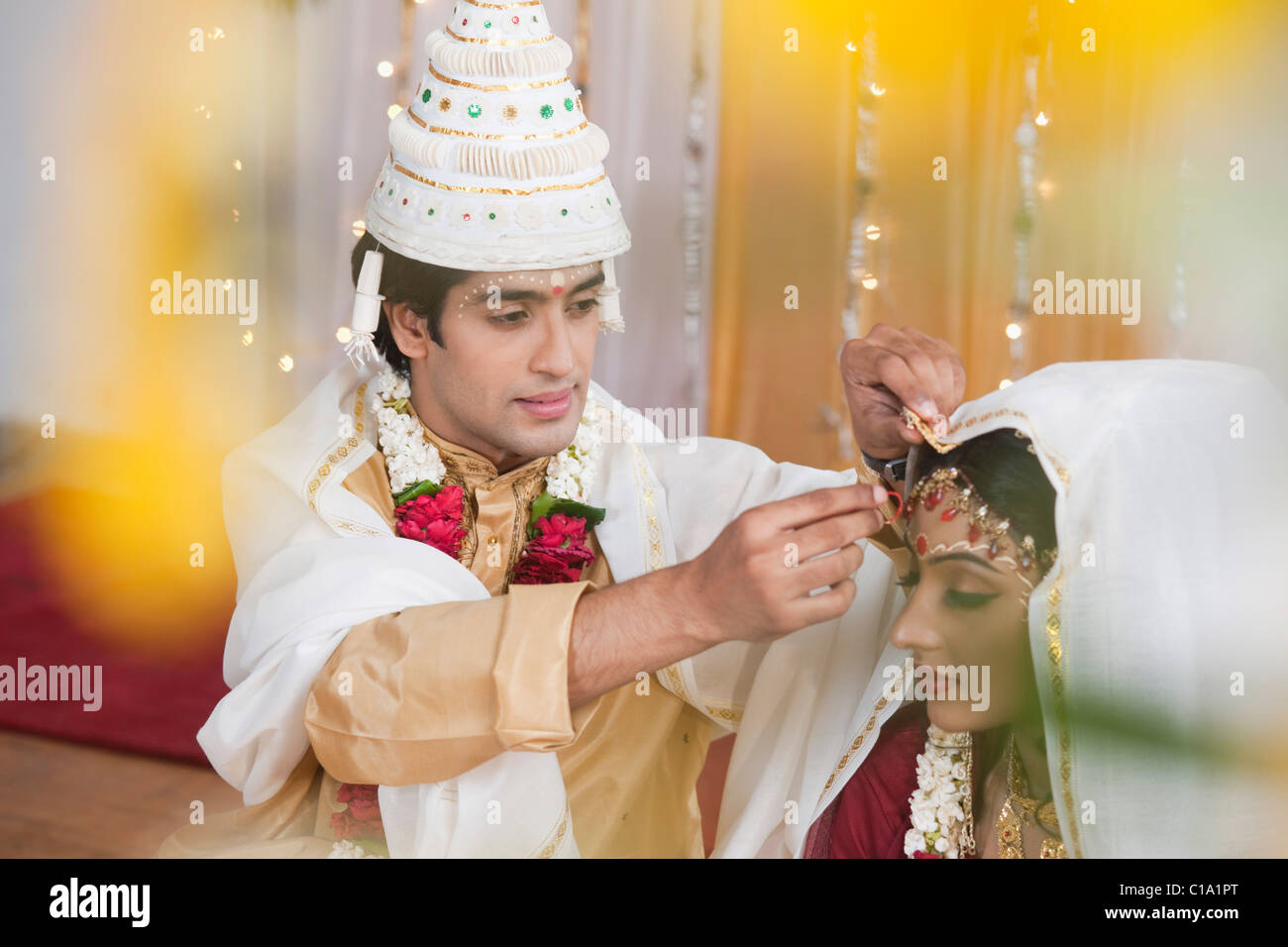 Woman applying sindoor hi-res stock photography and images - Alamy