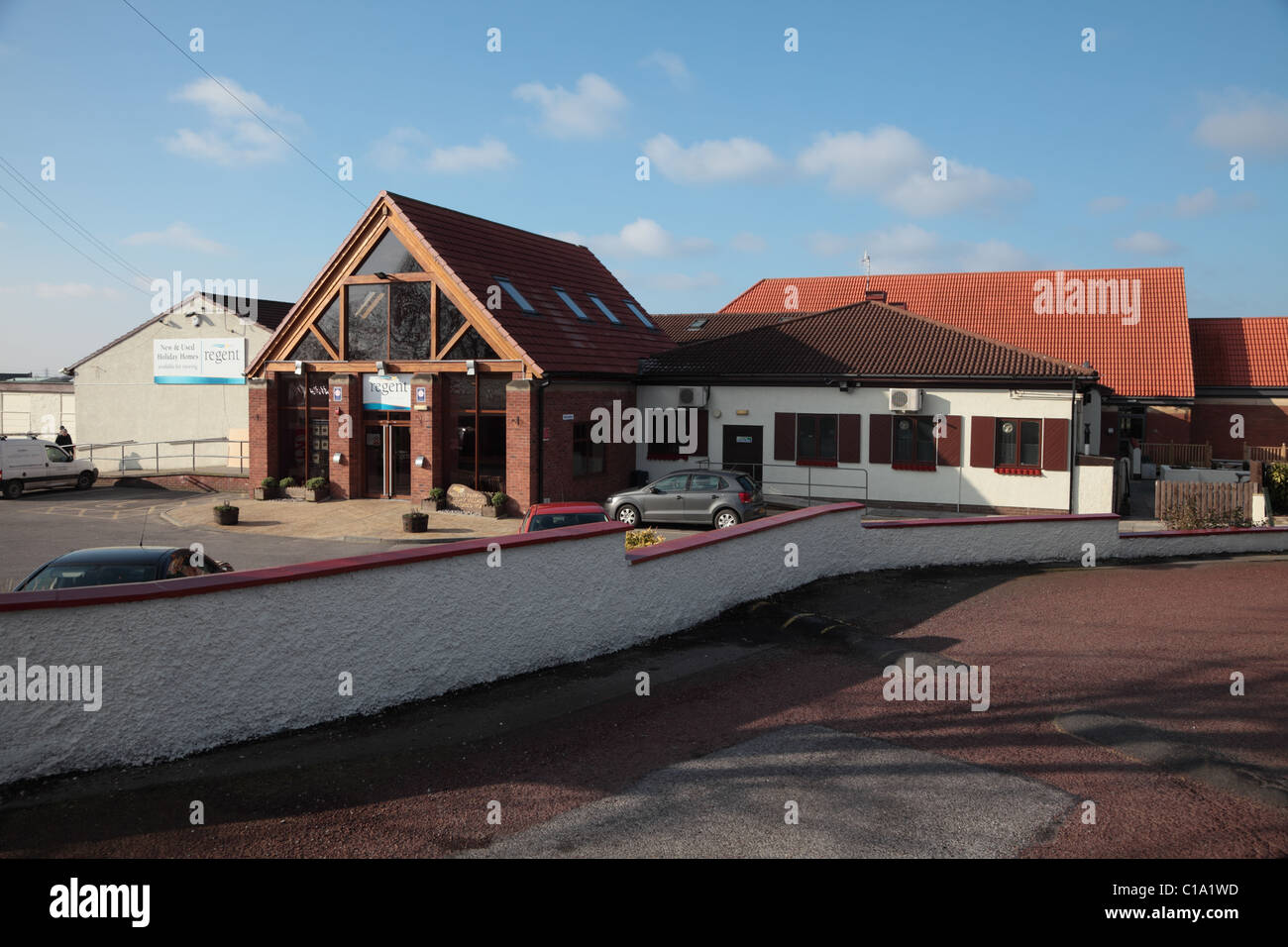Static caravan park entrance showing reception building Stock Photo - Alamy