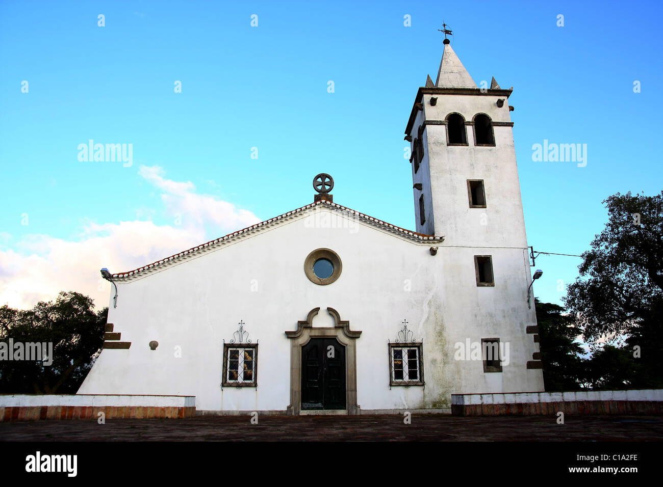 Full frontal view of a small christian church on the village of ...