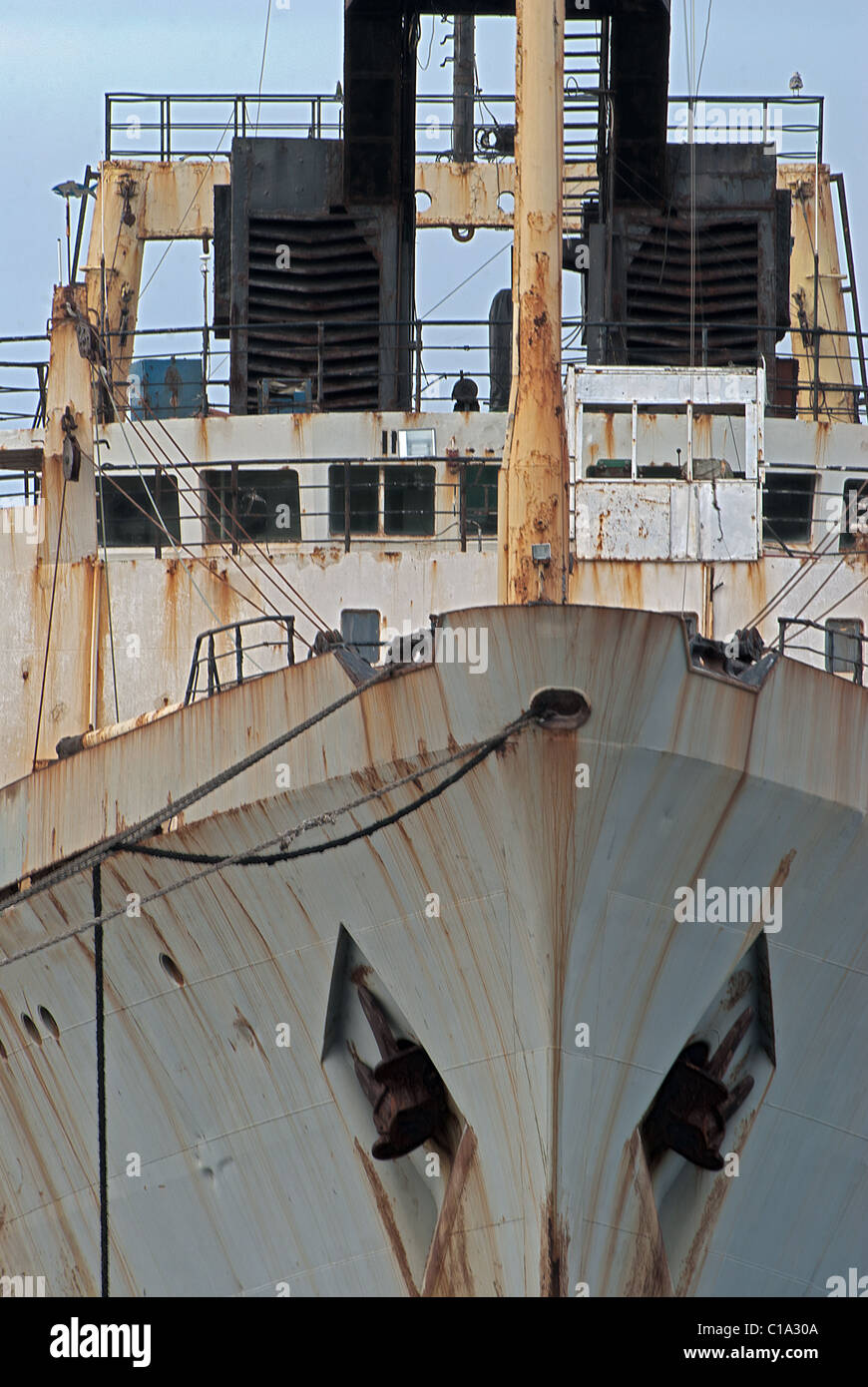 Rusty old ship waiting for dismantling Stock Photo - Alamy