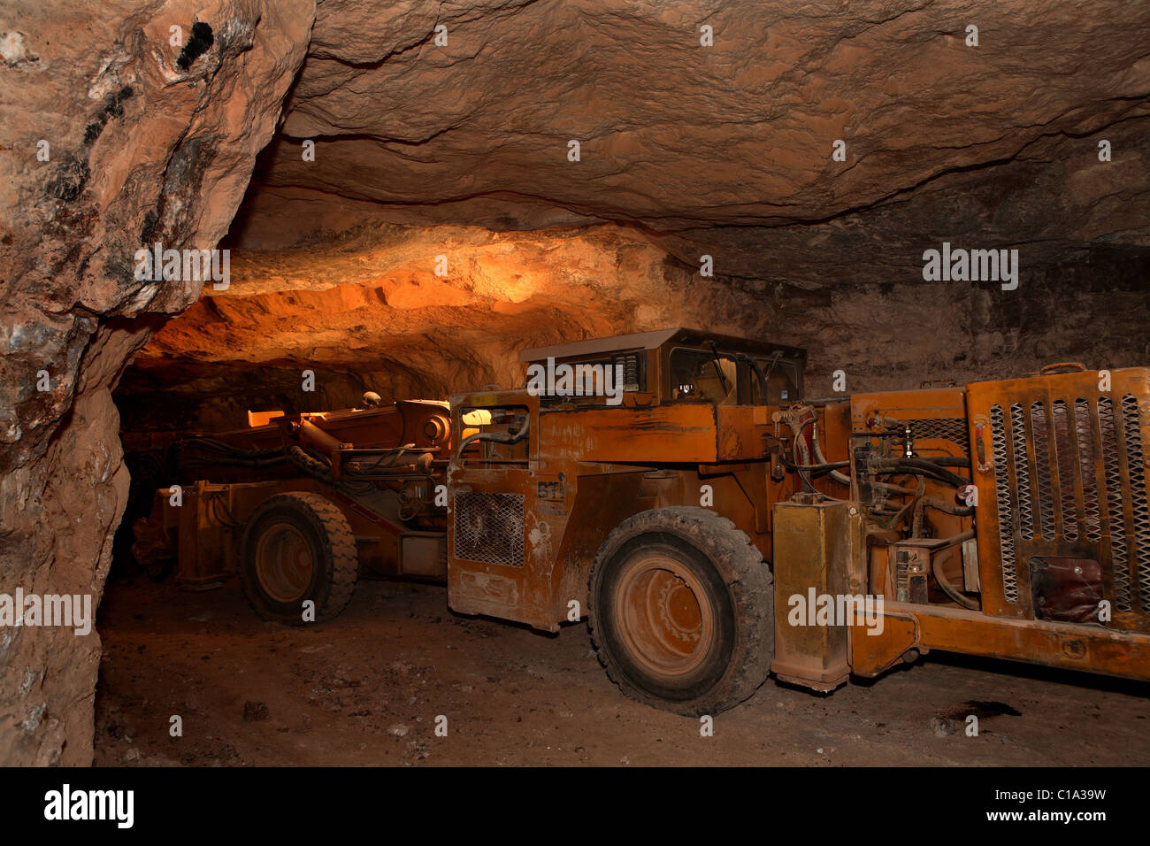 Roof scaler at work in mine Stock Photo - Alamy