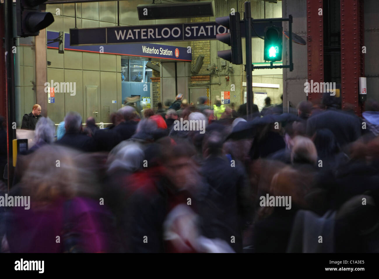 People crossing the road and walking into Waterloo train station in the ...