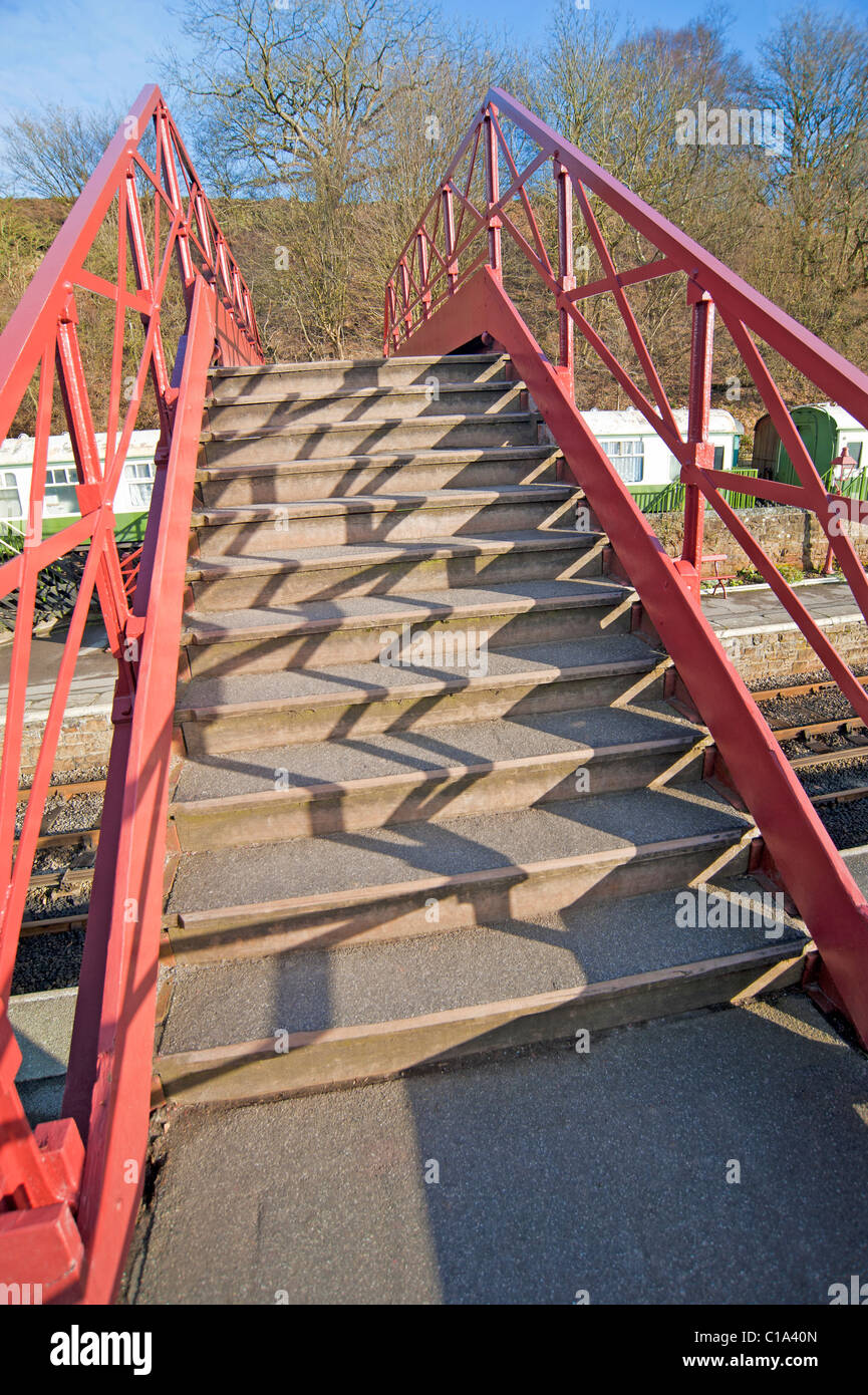 Old metal footbridge over a railway line Stock Photo - Alamy