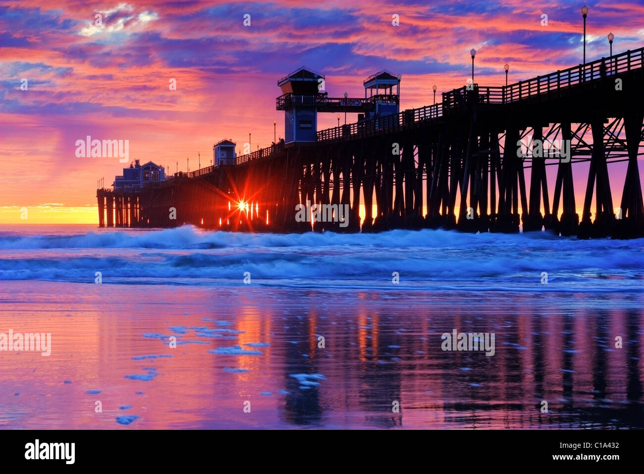 USA. The sky is so vibrant, at this incredible sunset. Captured at the Oceanside Pier in ...