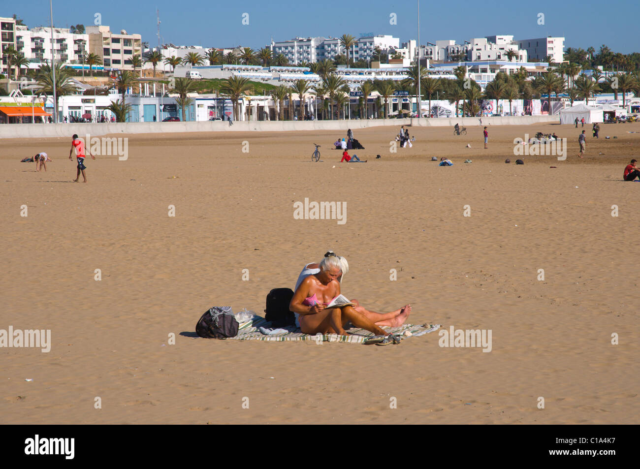 People on beach Agadir the Souss southern Morocco Africa Stock Photo ...