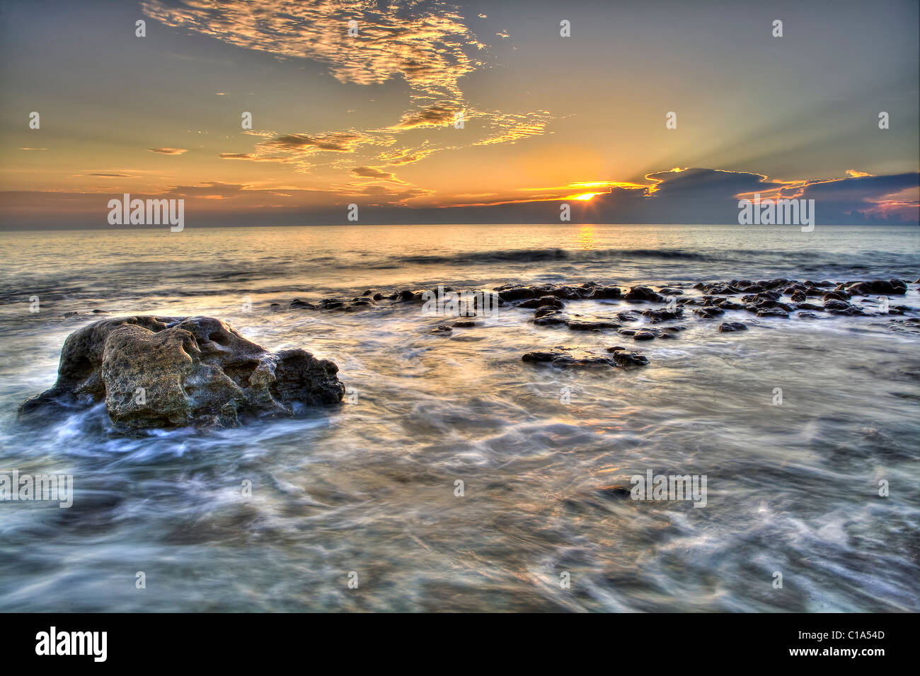 Sunrise over the rocks hi-res stock photography and images - Alamy