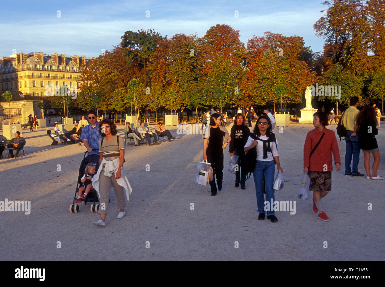 French people men and women friends getting together walking in ...