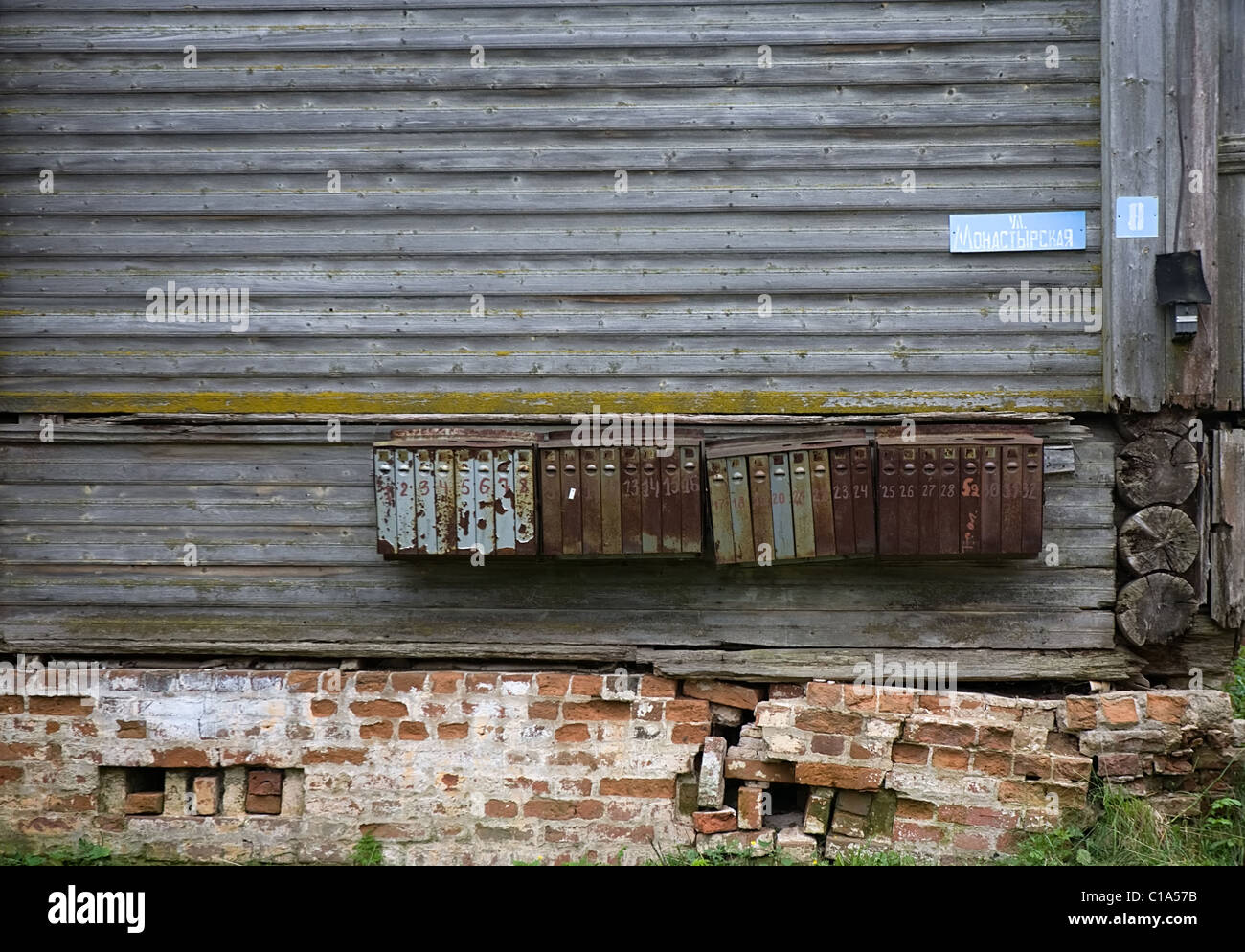 old rusty mail boxes on wooden wall of russian village house Stock ...