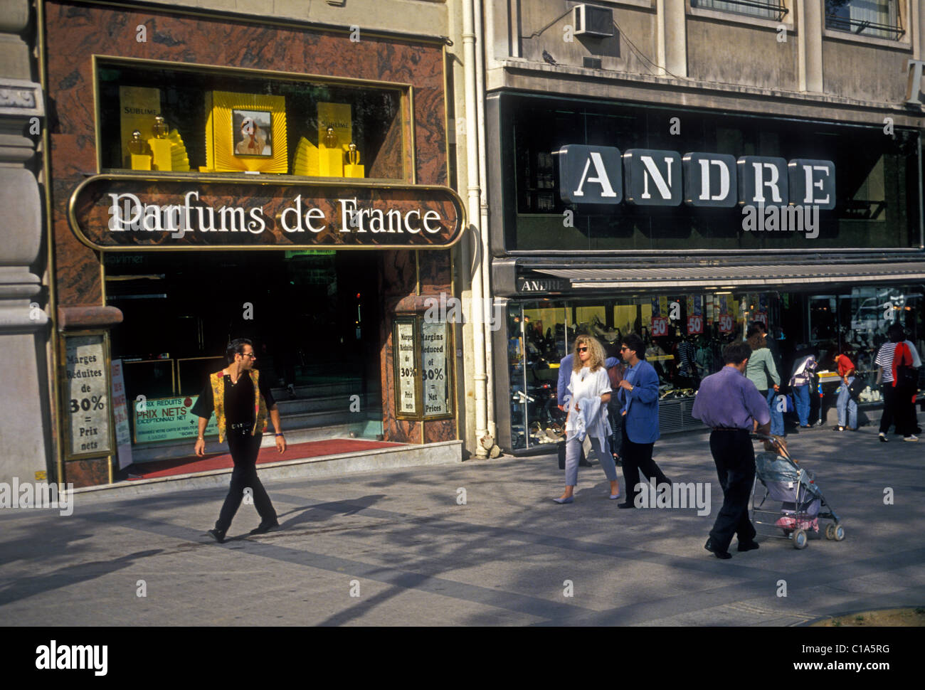 French people person shopping Avenue des Champs-Elysees city of Paris ...