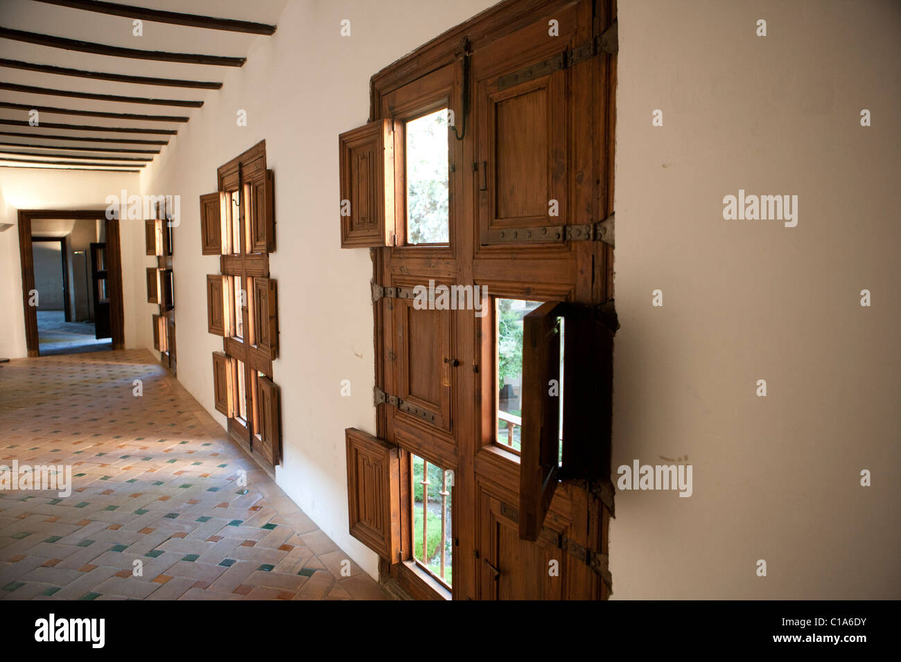 Hallway with multiple opening windows. Alhambra Palace, Granada ...
