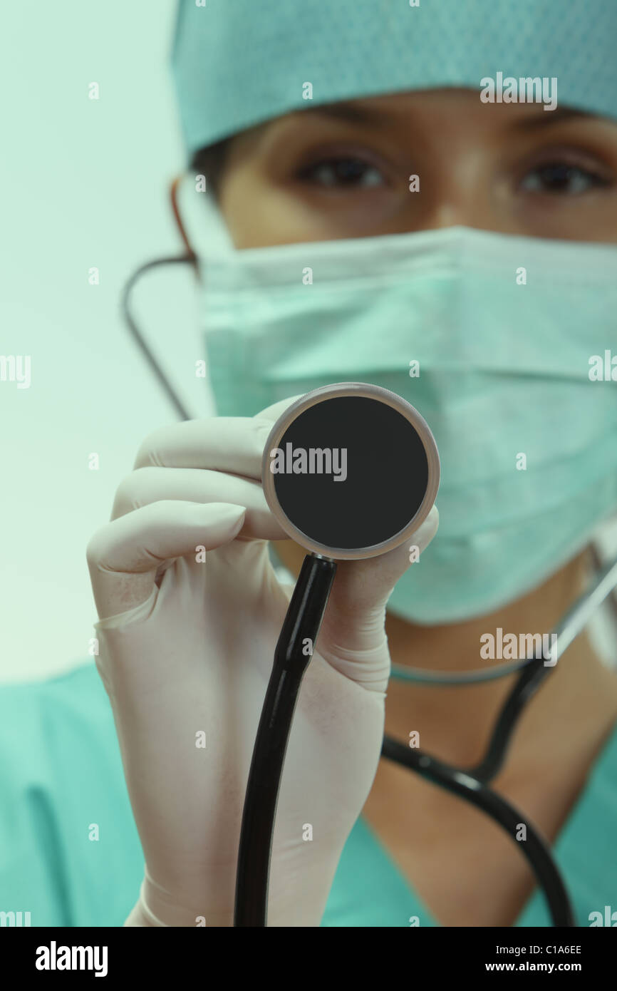 Female doctor with stethoscope in an emergency room lighting ...