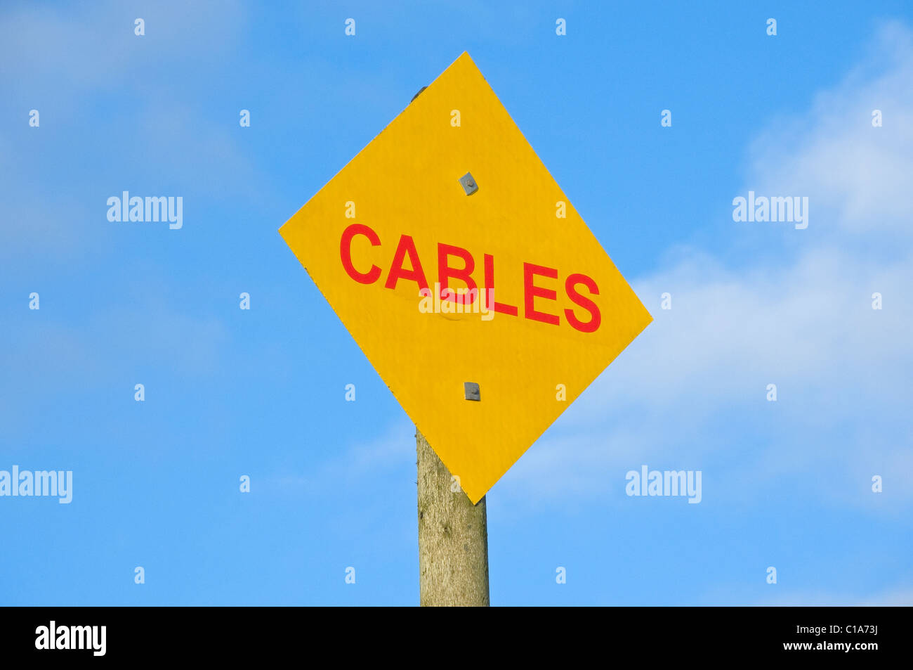 Close up of electric electricity power cable cables warning sign Wales ...