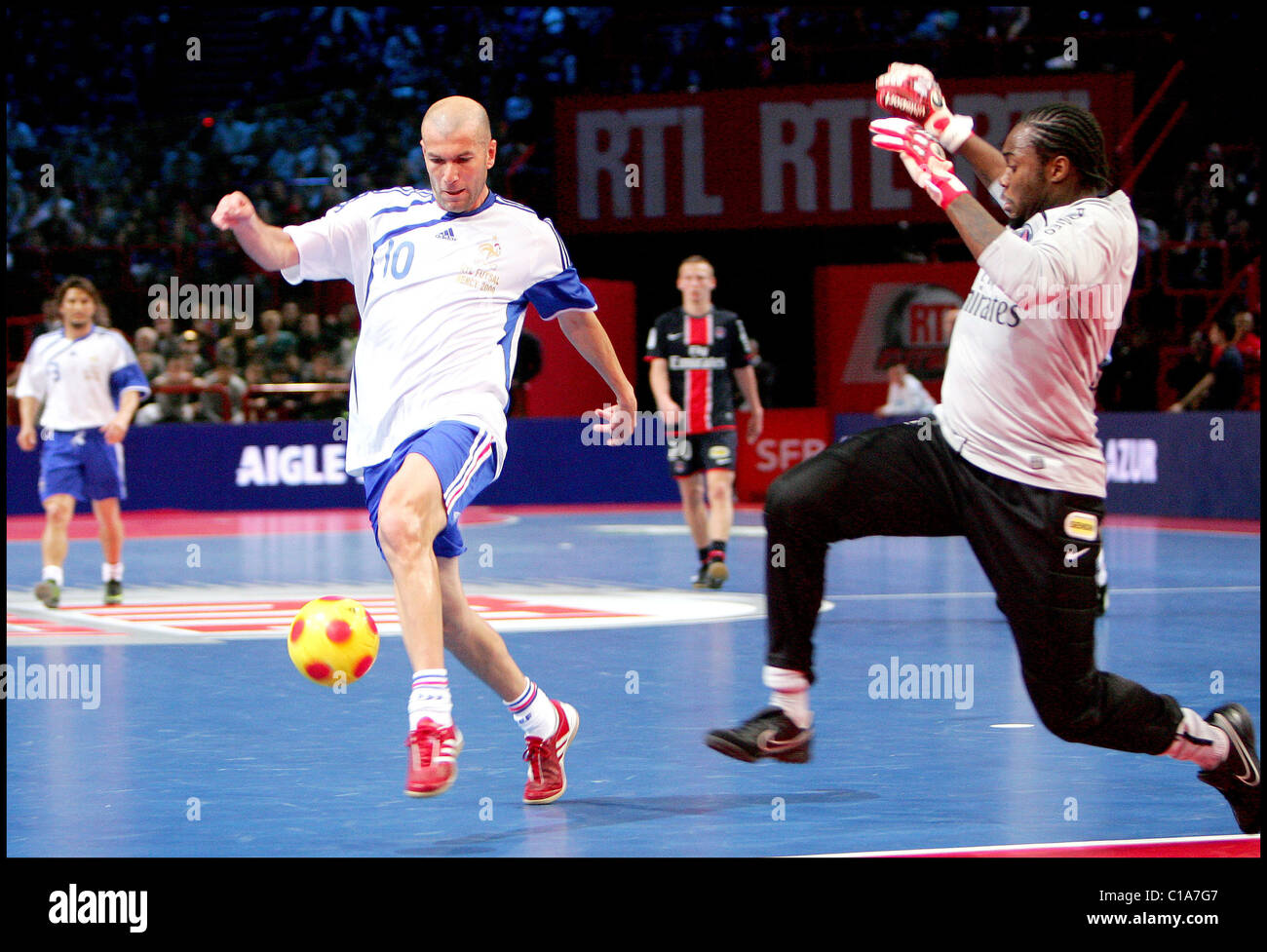 Zinedine Zidane and Edel Apoula France v PSG Portugal at the fourth ...