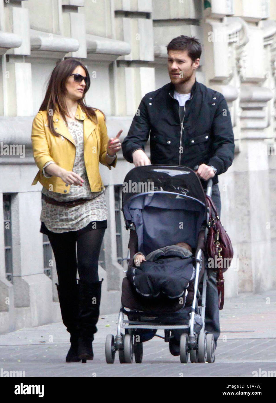 Xabi Alonso with girlfriend Nagore Aranburu and their baby Jontxu ...