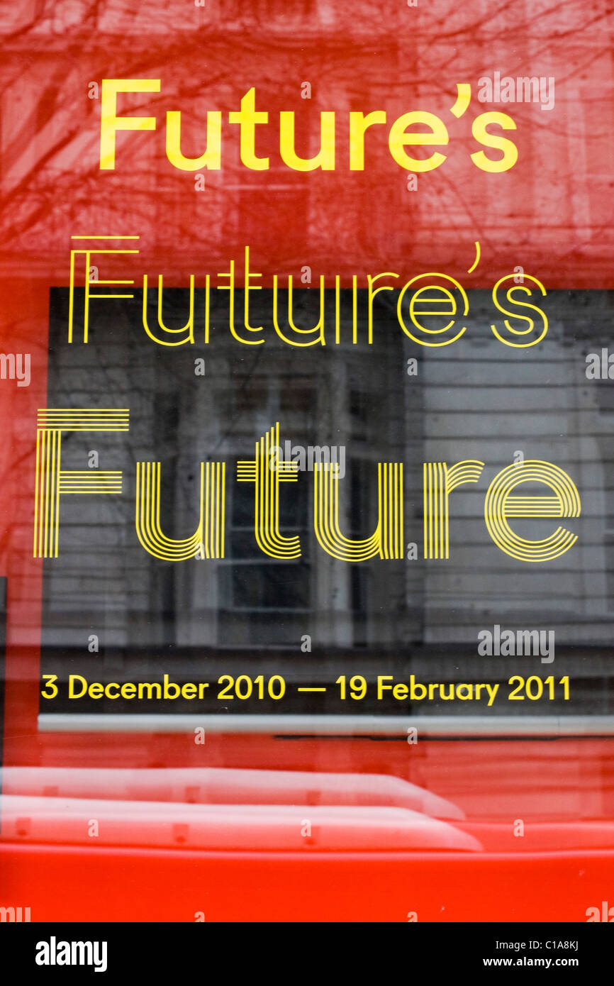 Window Sign with the Word Future on and a reflection of a London Red ...