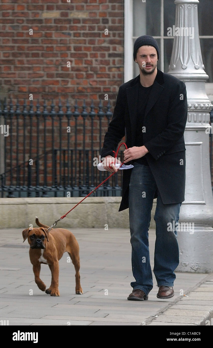 Watchmen star Matthew Goode hailing a taxi with his Boxer puppy Dublin ...