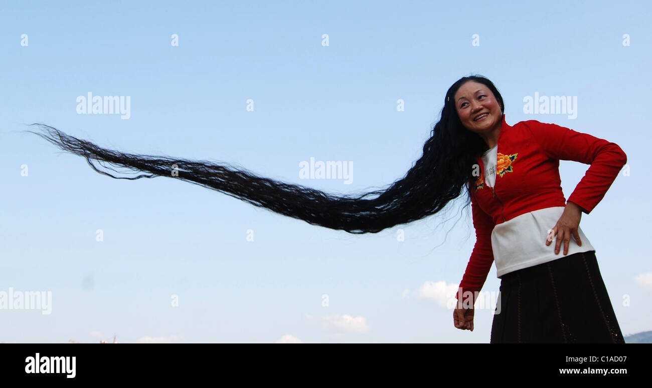 Eight feet long hair Cheng Shiqun, from Yunyang, China, shows off her ...