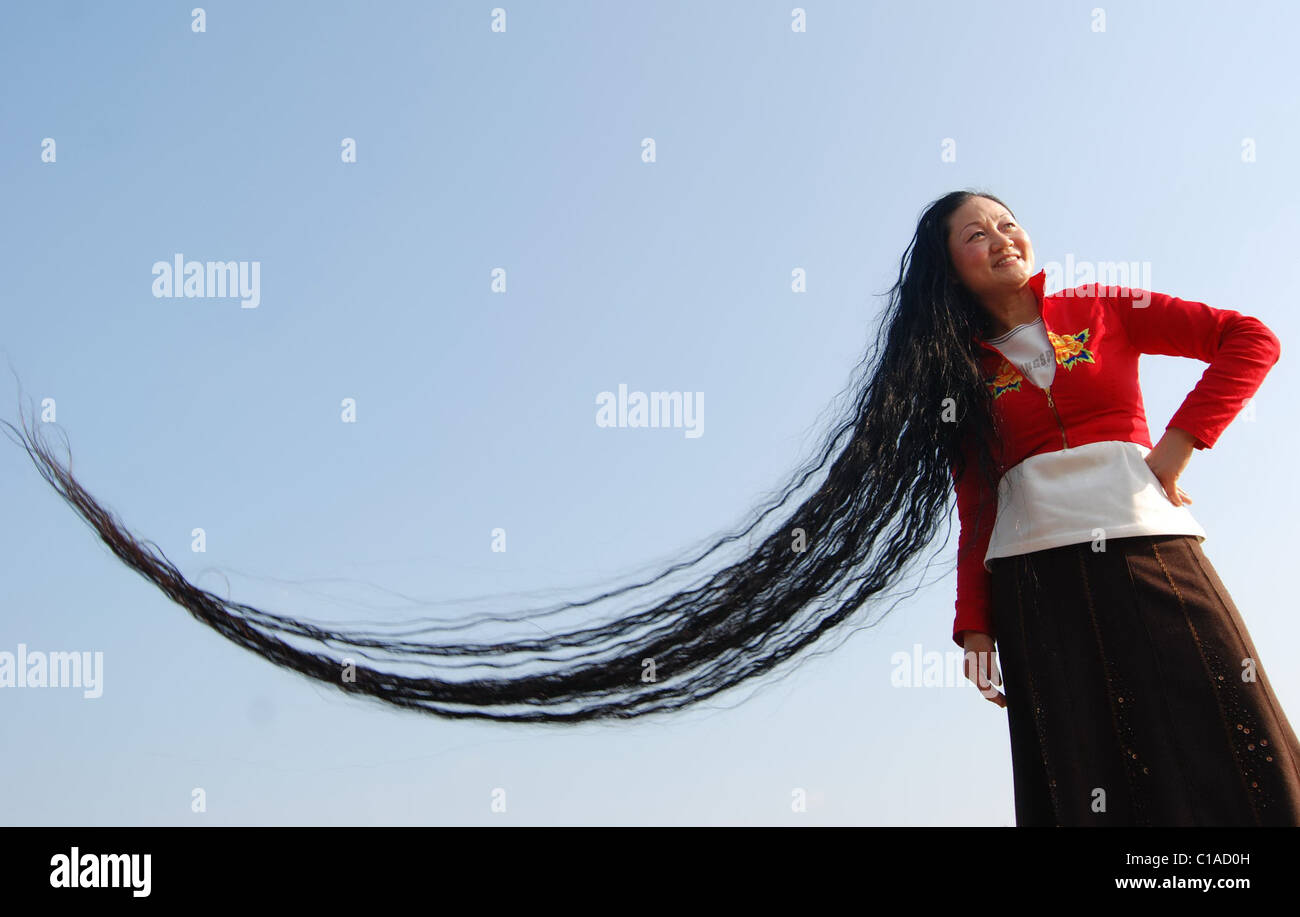 Eight feet long hair Cheng Shiqun, from Yunyang, China, shows off her ...