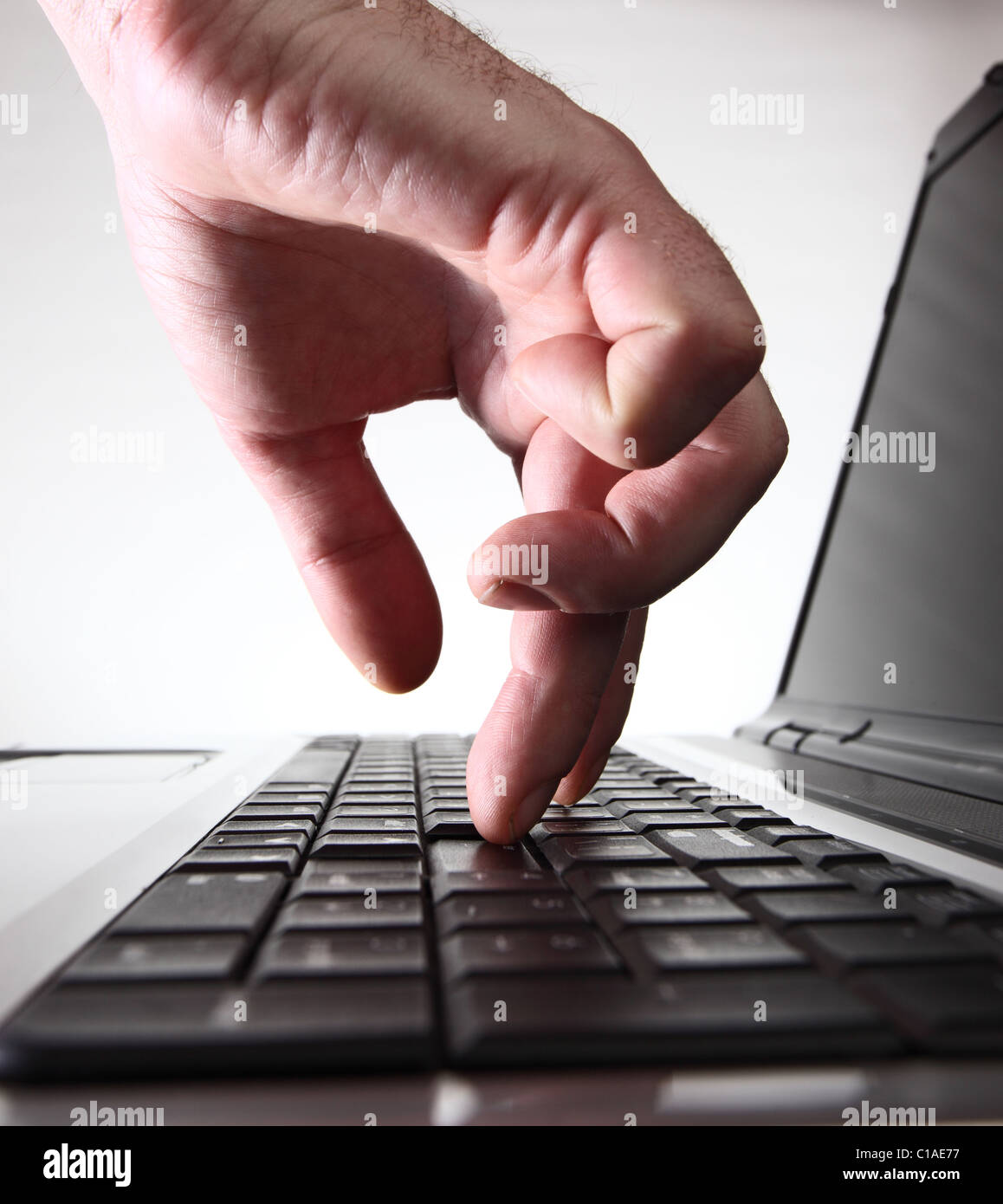 Hand over the black keyboard Stock Photo - Alamy