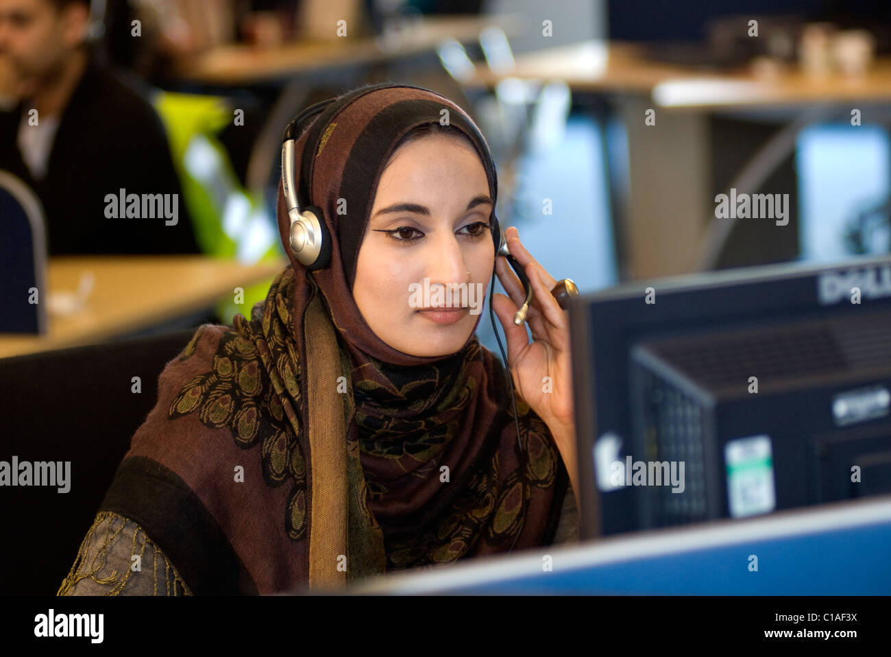 Muslim Call Centre Worker UK Stock Photo - Alamy