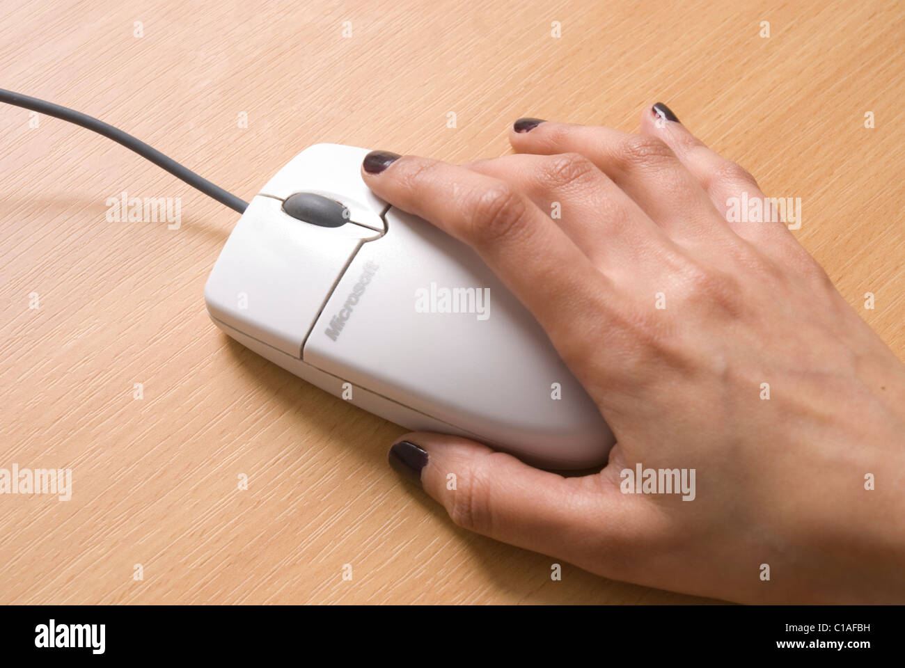 Computer mouse and hand Stock Photo - Alamy