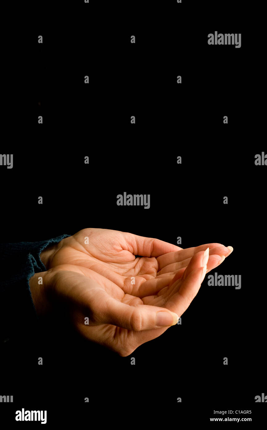 female hands in a gesture of receiving with open palms Stock Photo - Alamy