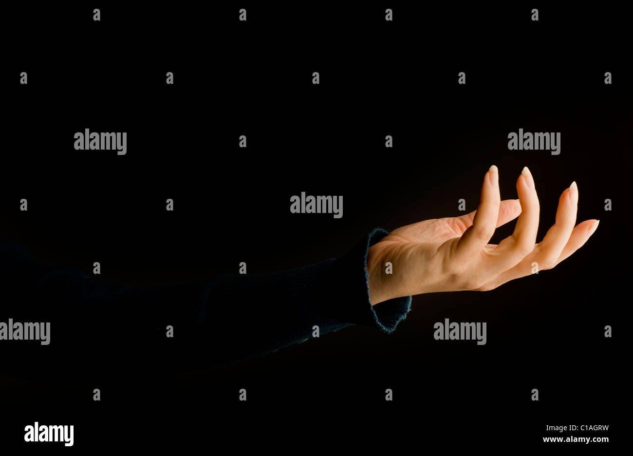female hand gesture of giving Stock Photo - Alamy