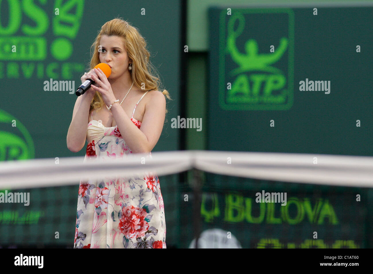 Latin singer Ana Cristina sings the National Anthem before the tennis ...