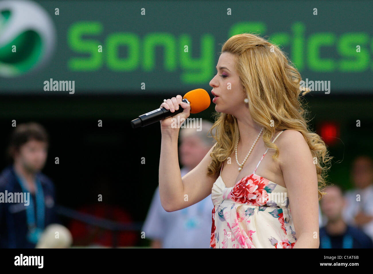 Latin singer Ana Cristina sings the National Anthem before the tennis ...