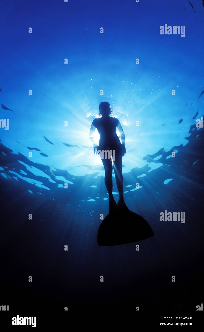 France, Corse du Sud, play of light with a monofin diver Stock Photo ...