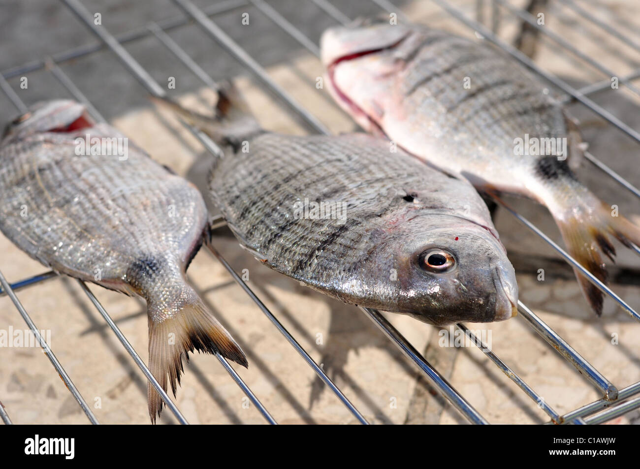 fish on grill Stock Photo - Alamy