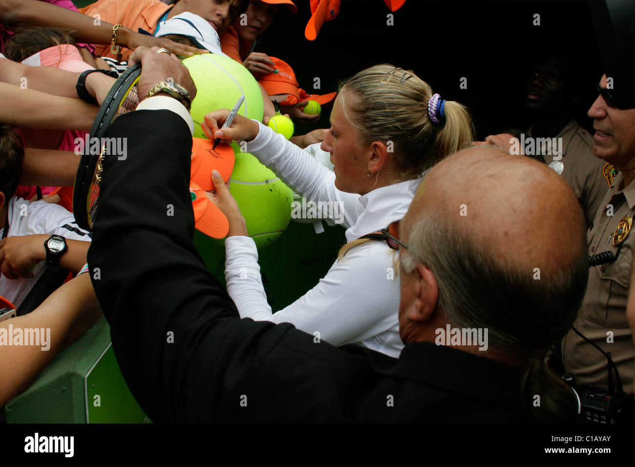 Victoria Azarenka signs autographs after the women's trophy ...