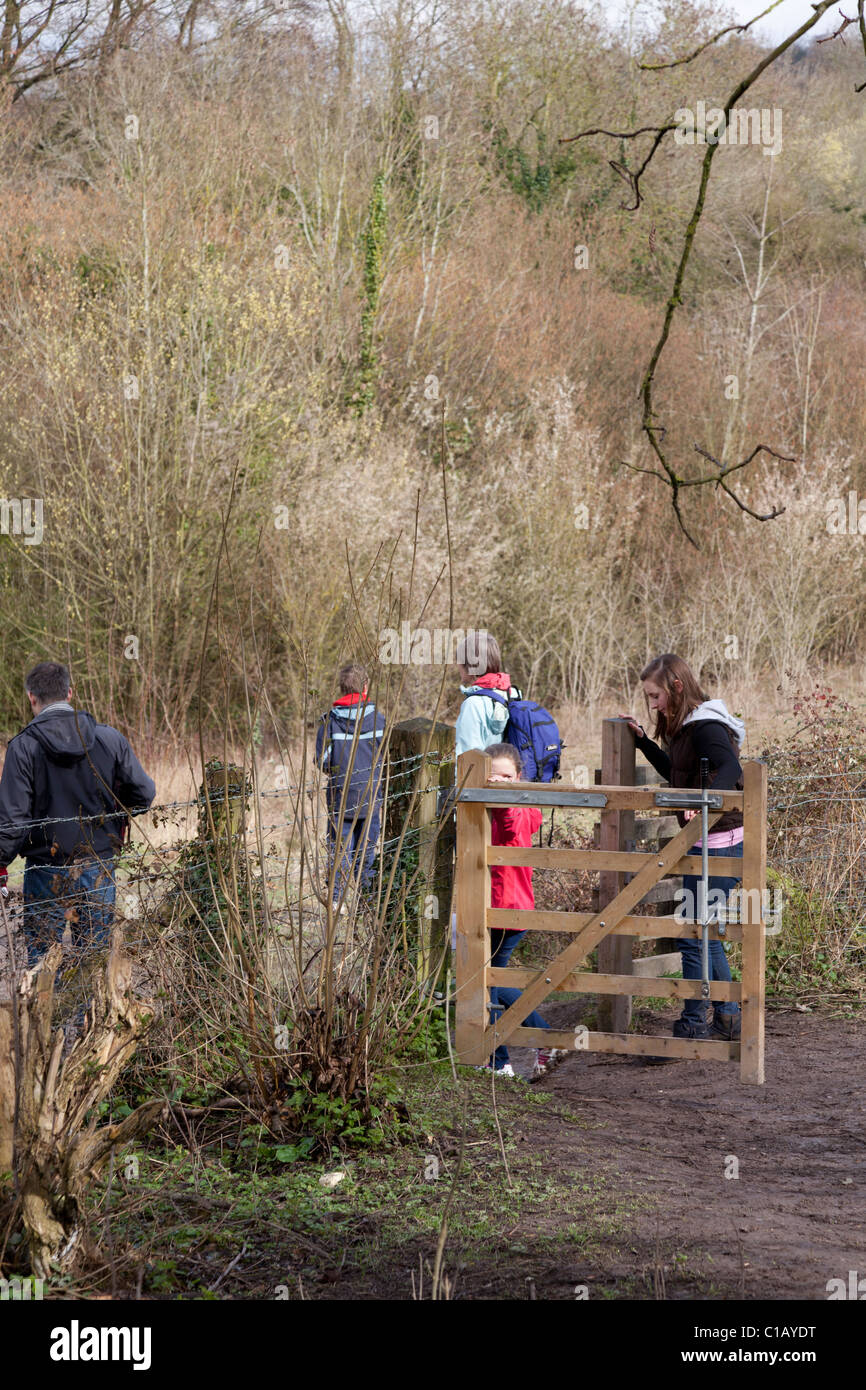 Walkers passing through gate hi-res stock photography and images - Alamy