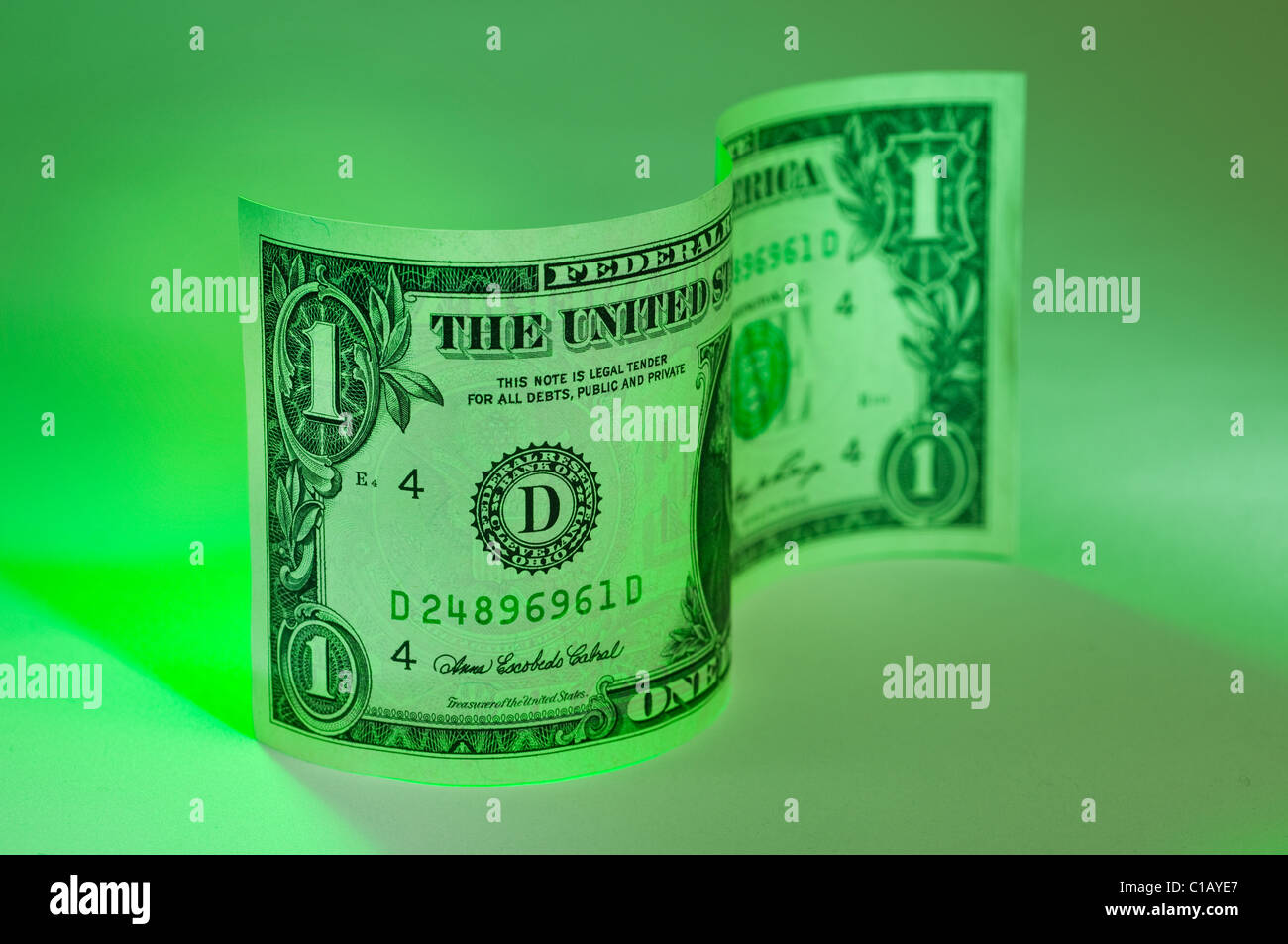 a dramatically lit dollar bill Stock Photo - Alamy