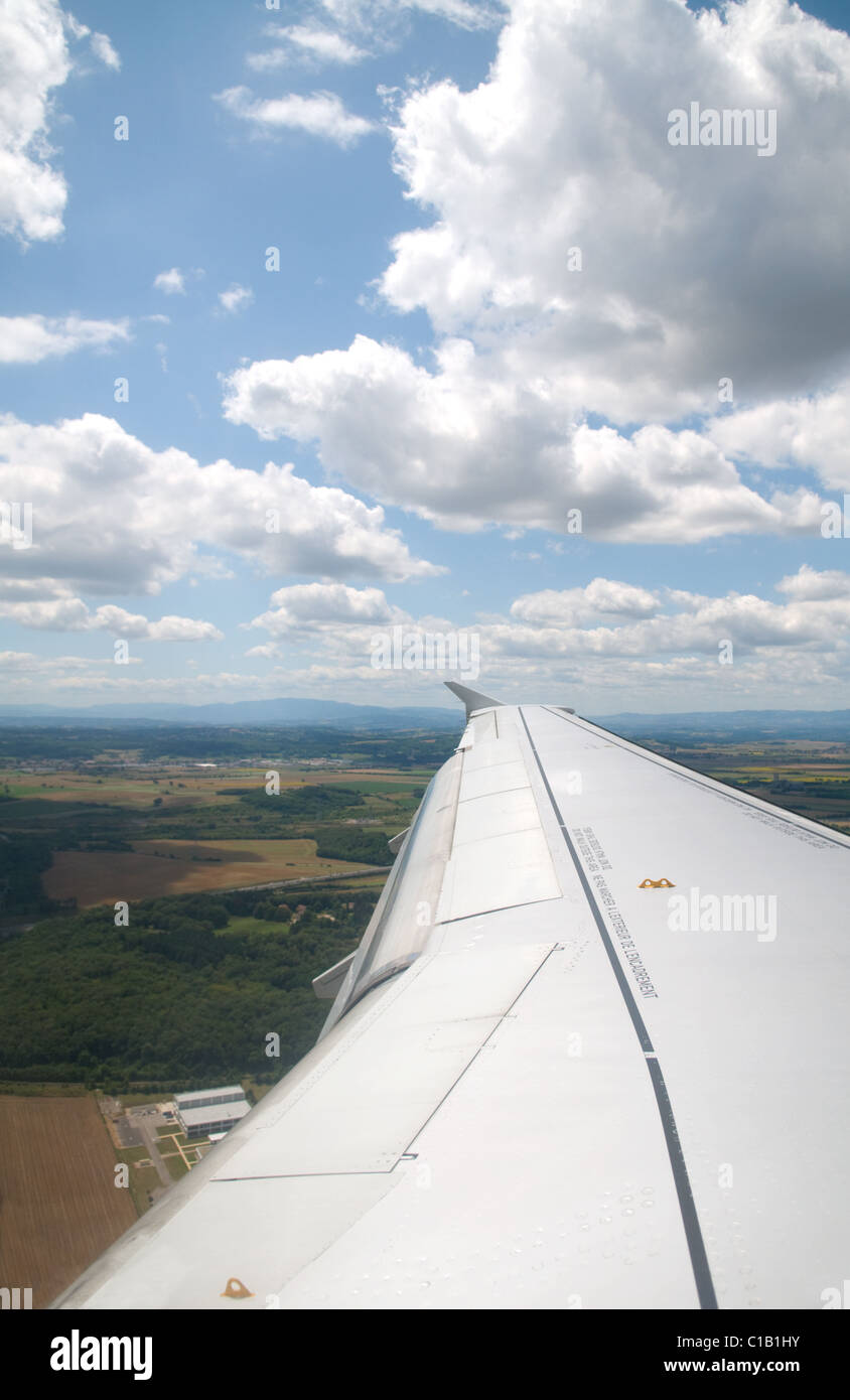 Wing of an airplane Stock Photo - Alamy
