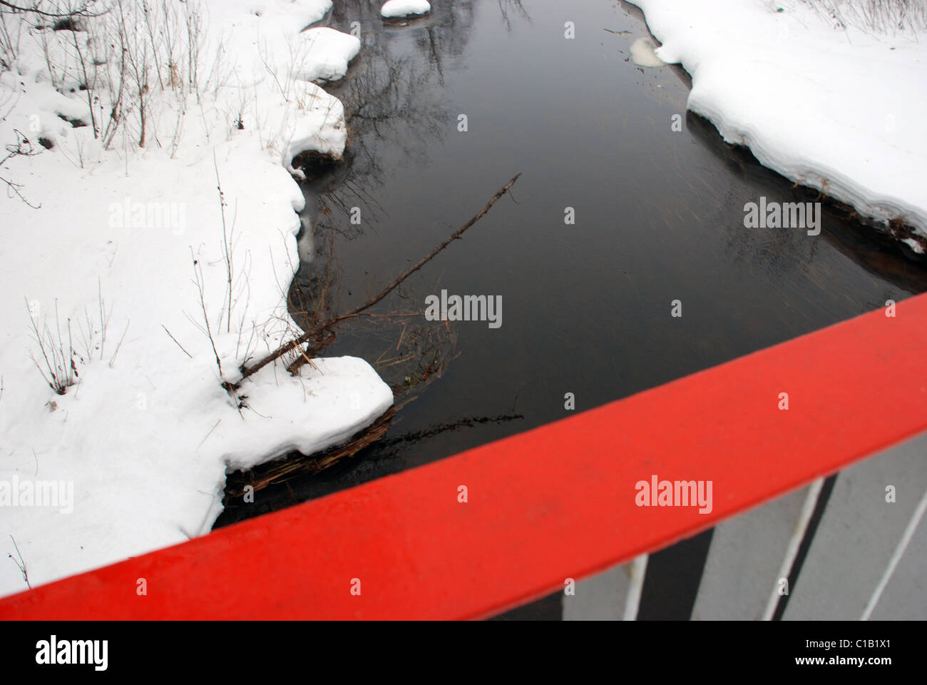 wildwater river in cold winter visible from bridge through it Stock ...