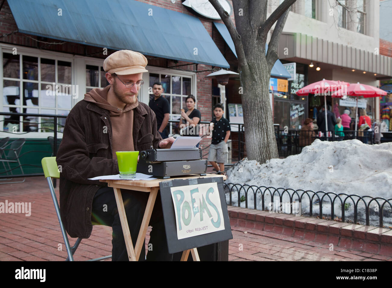 Man typewriter offers write poems hi-res stock photography and images ...