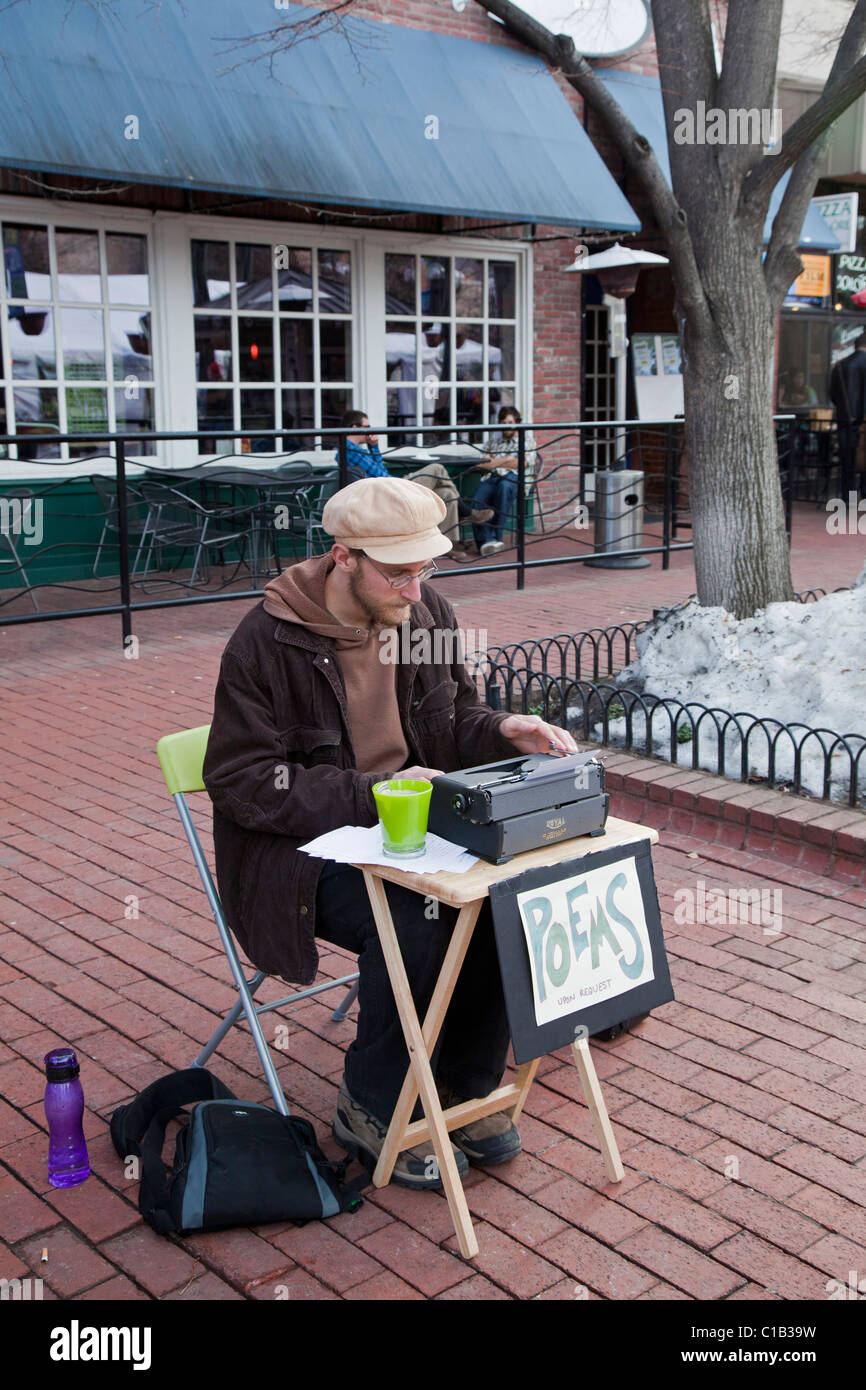 Man typewriter offers write poems hi-res stock photography and images ...