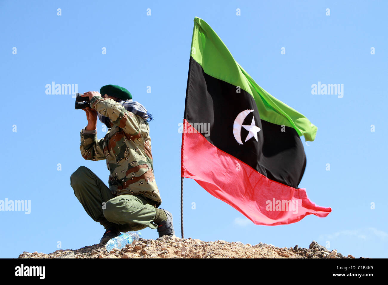 Libyan rebels lookout for Gaddafi Army troops Stock Photo - Alamy