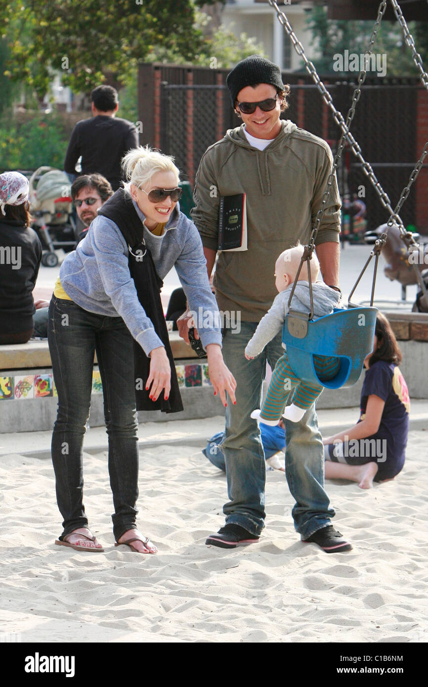 Gwen Stefani pushes baby Zuma in a swing as husband Gavin Rossdale ...