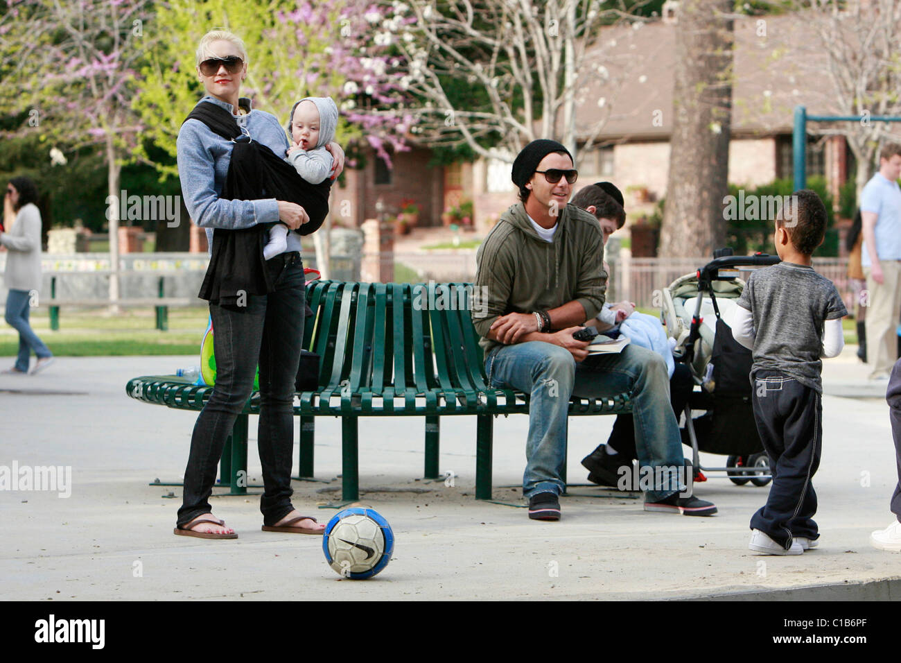 Gwen Stefani carries her baby Zuma in a baby carrier while husband ...