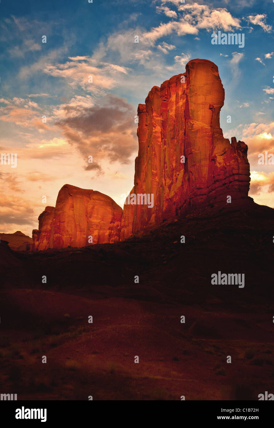 Monument Valley spire at sun down Stock Photo - Alamy