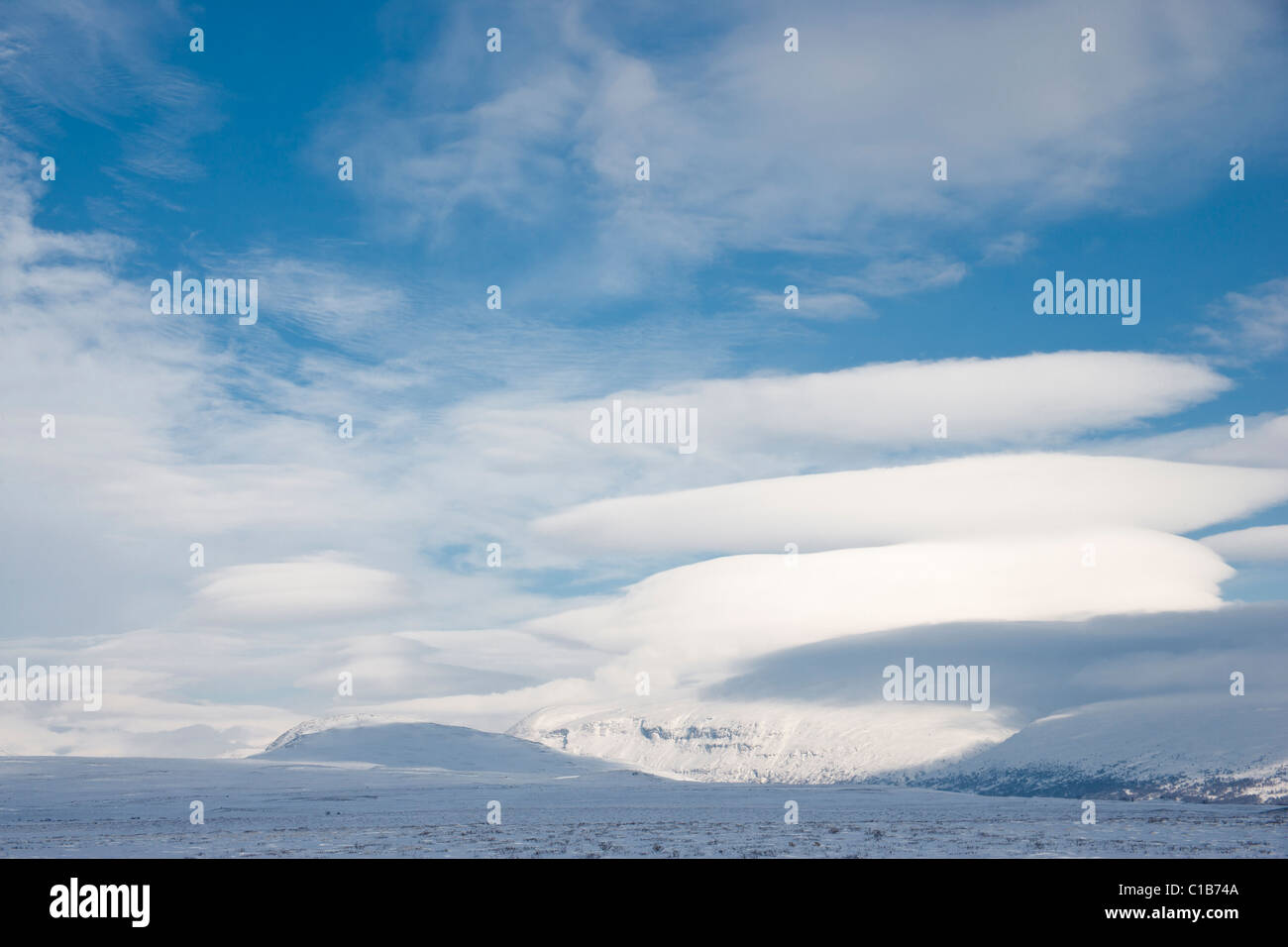 Lenticular clouds over Dovrefjell mountains Stock Photo - Alamy