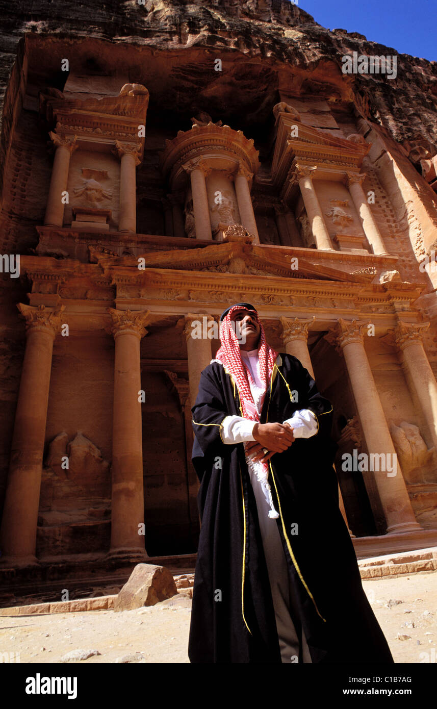 Jordan, Petra, Bedouin in front of Khazneh (the treasure), likely grave ...