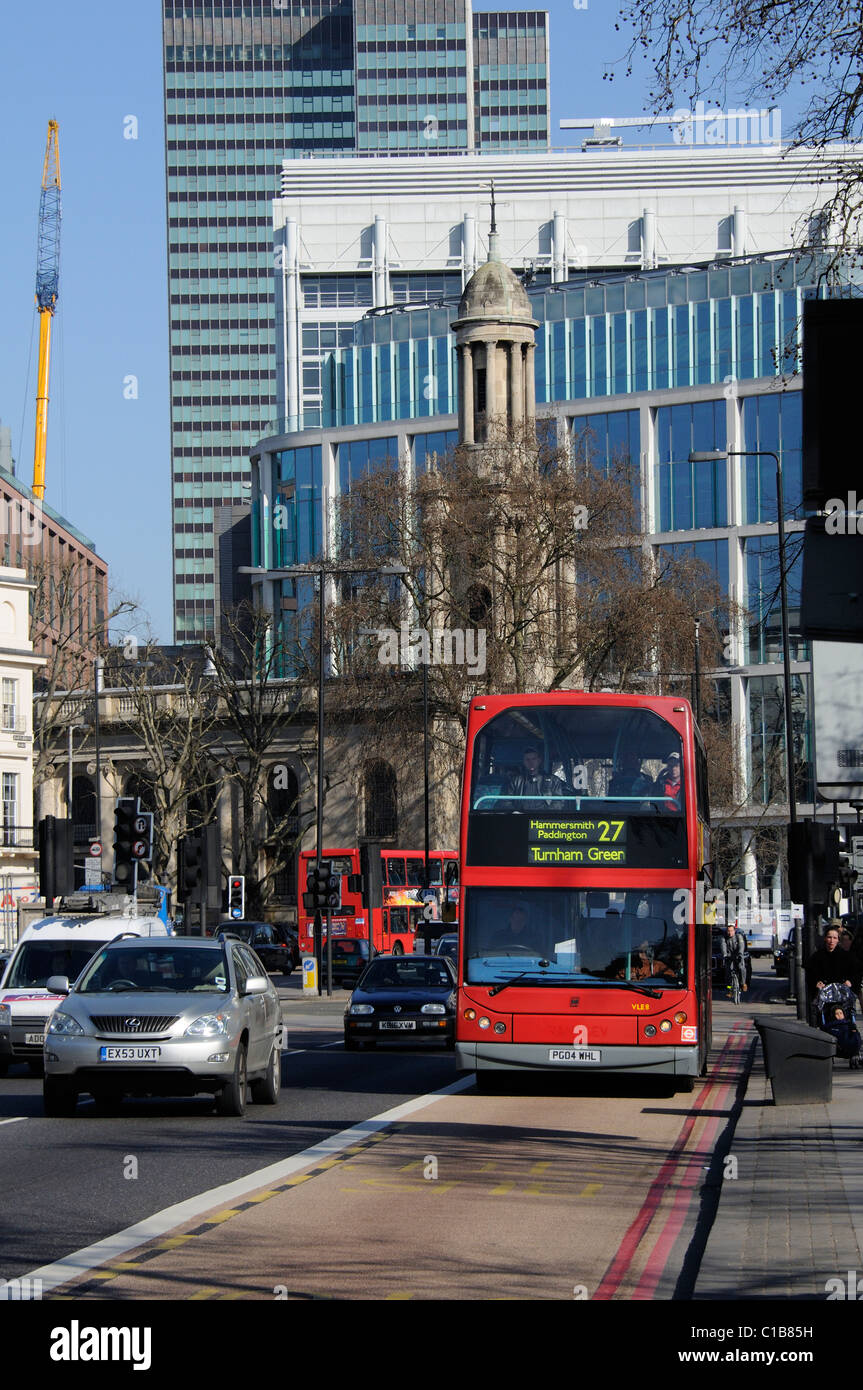 Red London bus using the bus lane on Marylebone Road London UK Stock ...