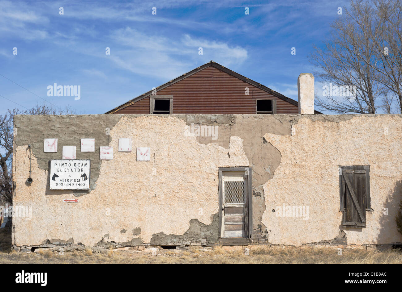 Now itself a relic of the past, the adobe Claunch Museum crumbles away ...