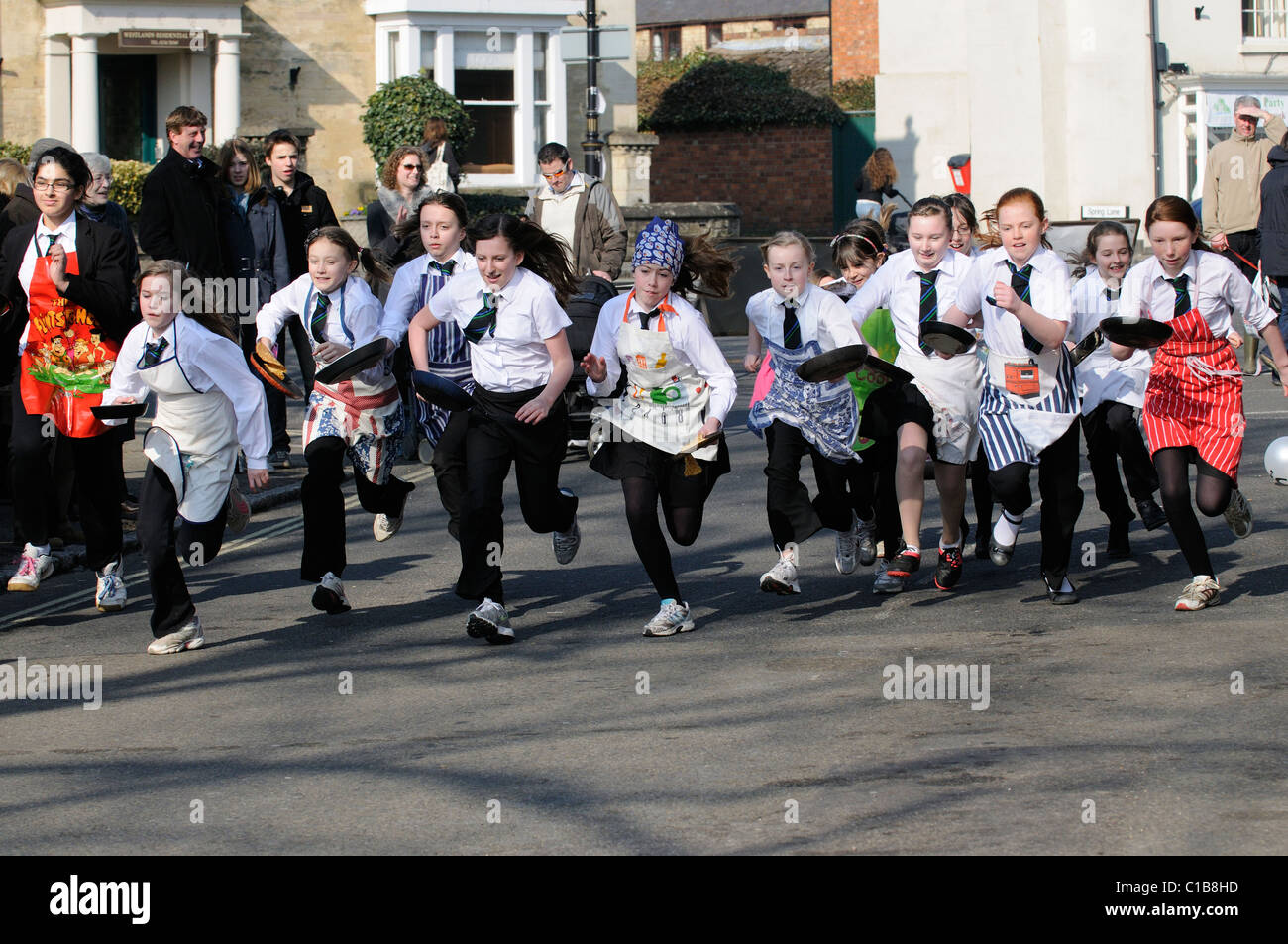 Olney Pancake race young girls competing in this annual event in Olney ...