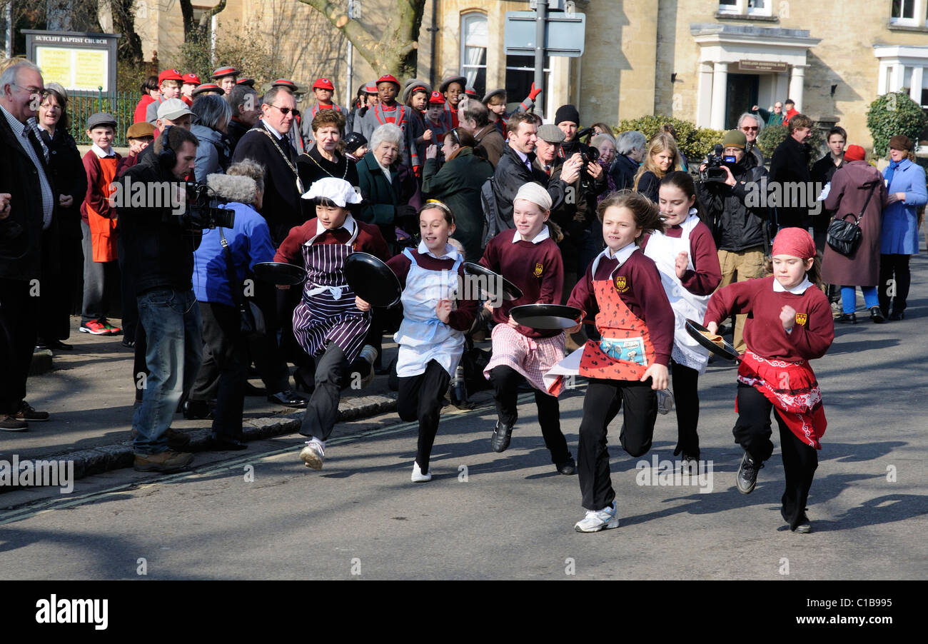 Olney Pancake race young girls competing in this annual event in Olney ...