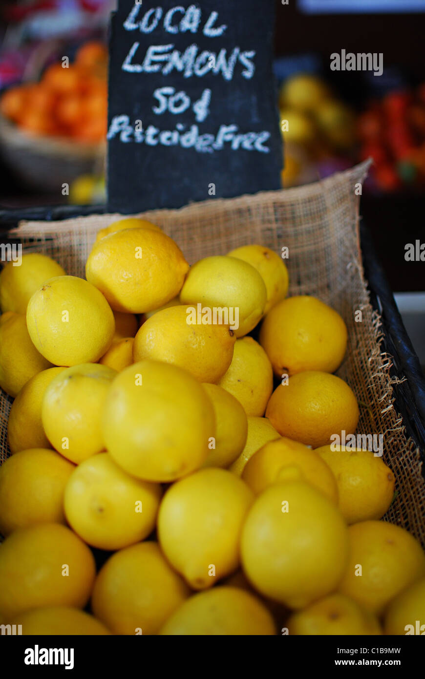 Lemons for sale at a local farmers market Stock Photo - Alamy