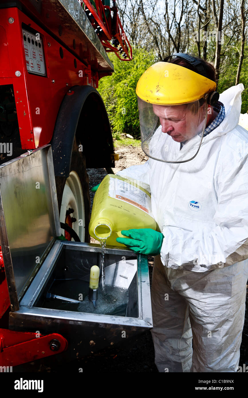 Filling sprayer tank with Chemicals Stock Photo - Alamy